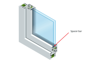 What is a spacer bar on a sealed unit window?
